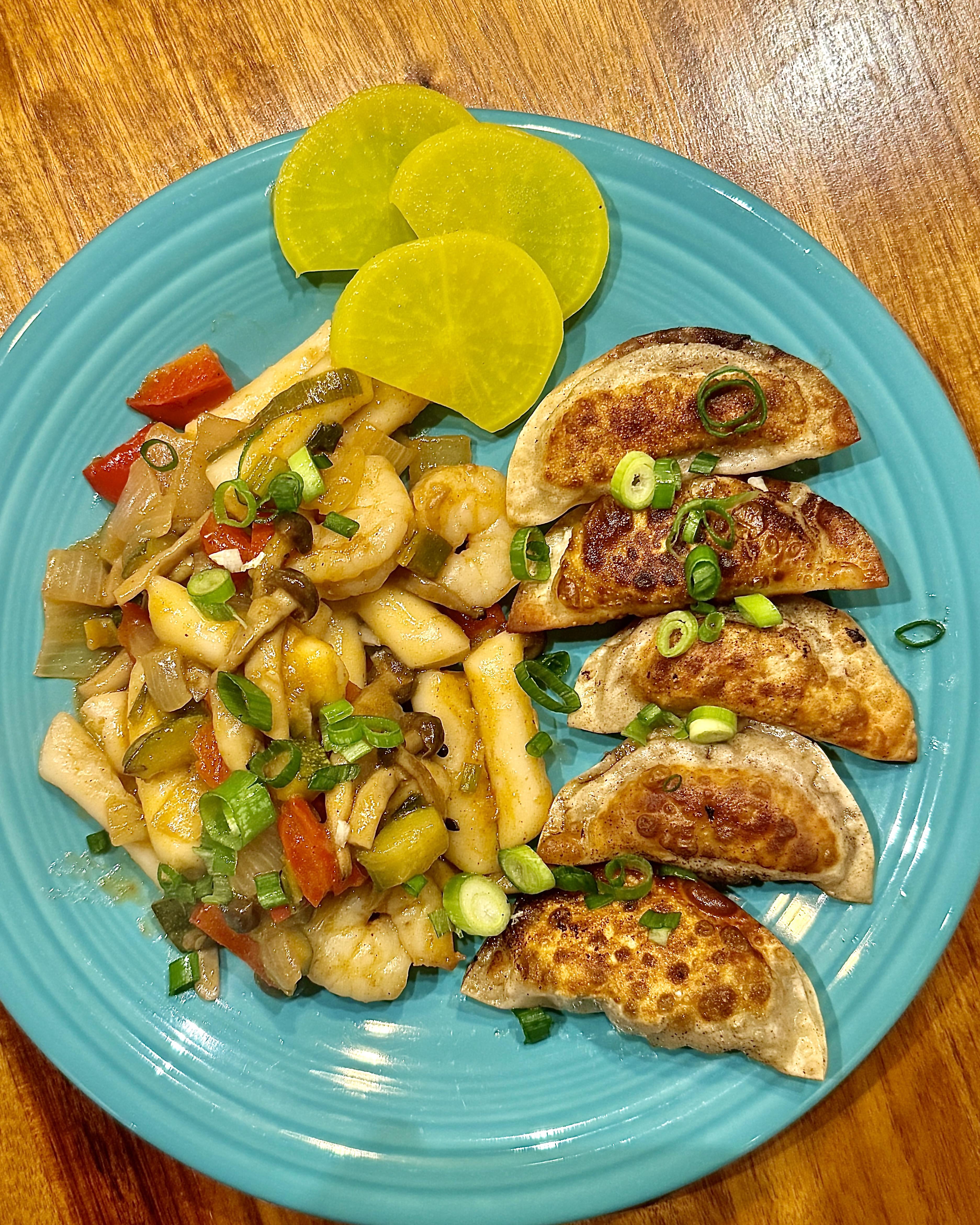 Homemade Korean pork mandu (dumplings), rice cakes with shrimp ...
