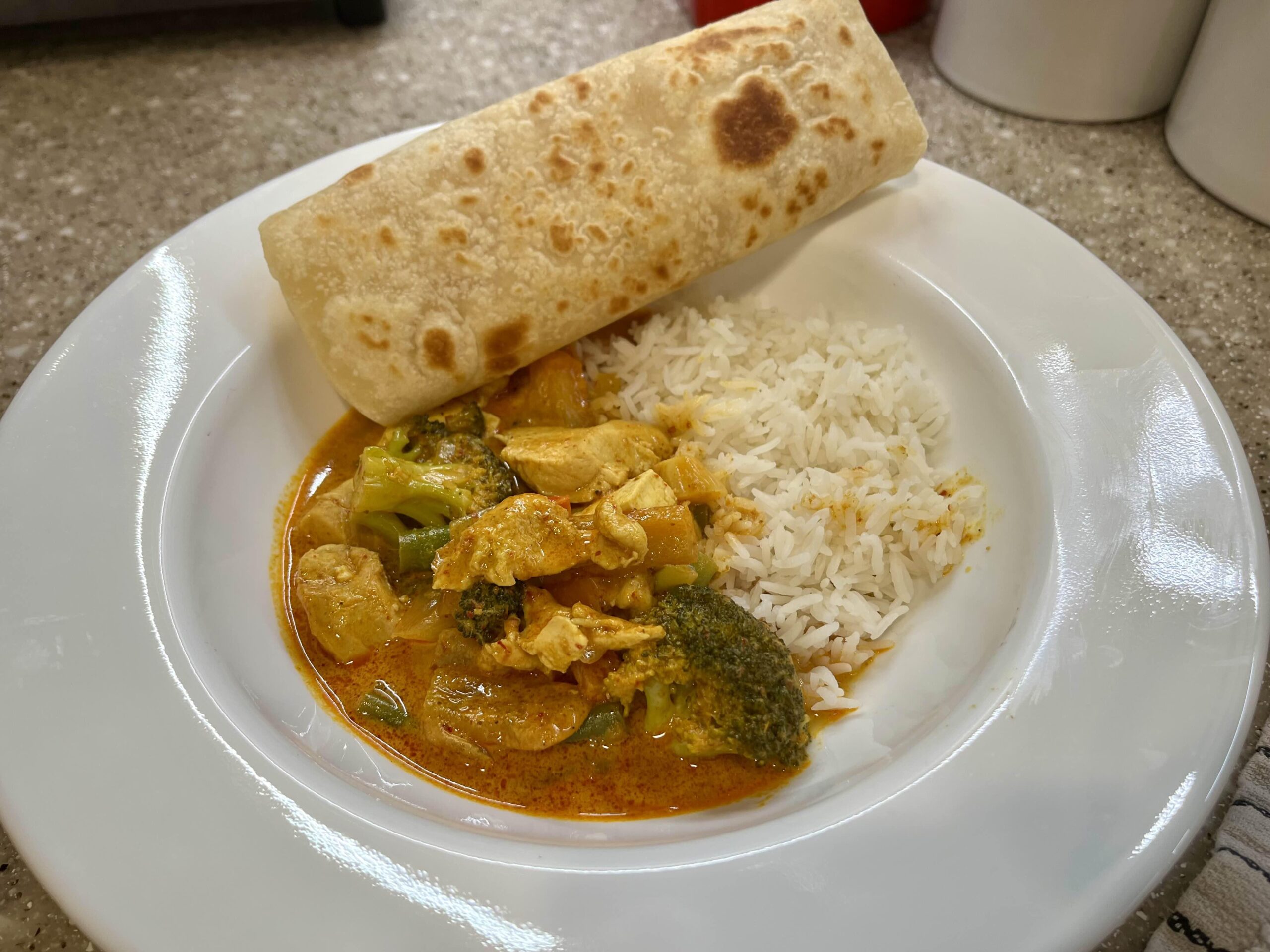 Thai yellow curry w/ homemade roti. - foodiedude