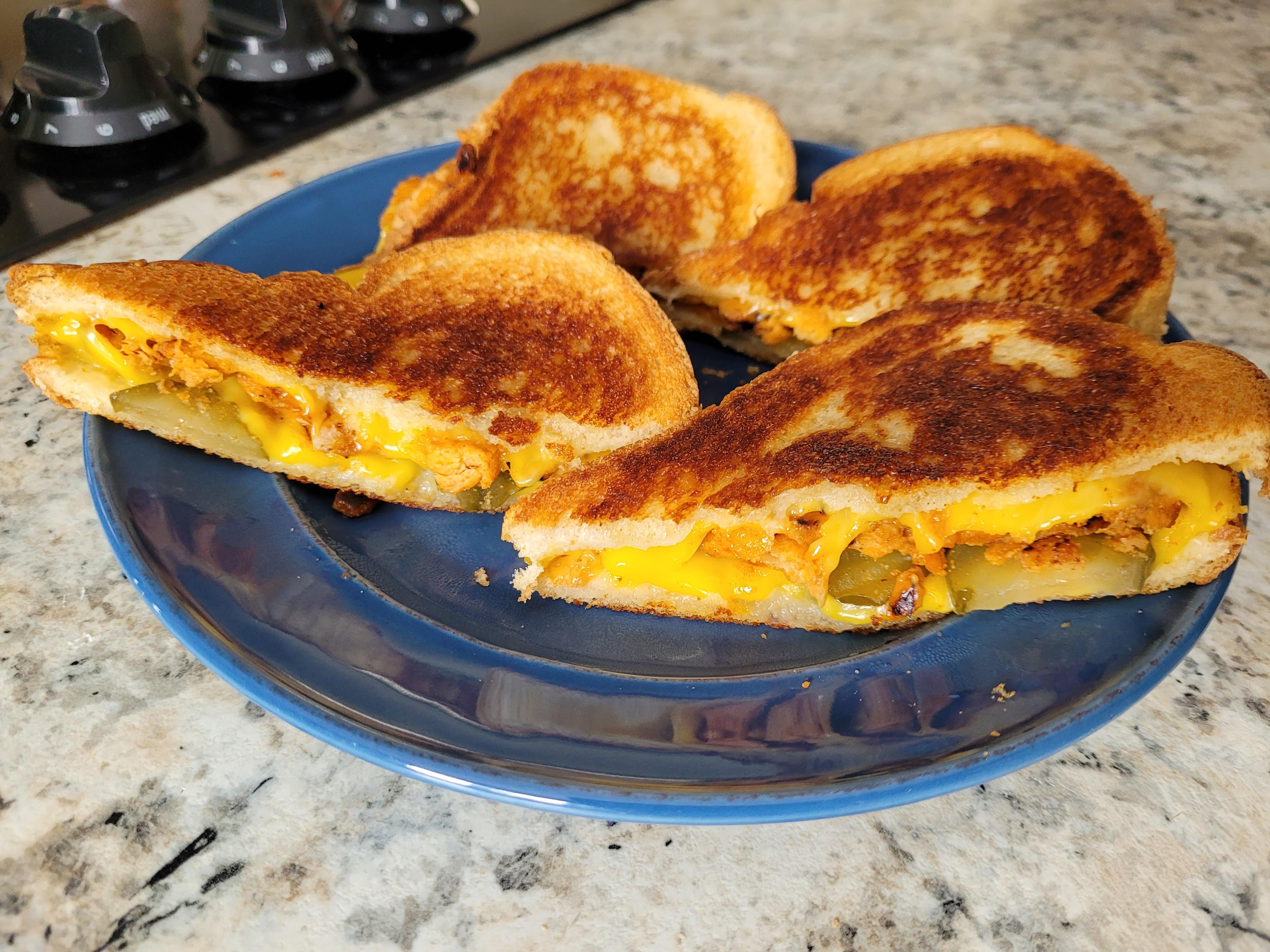 Buffalo soy curls and cheddar melt. 🤤 - foodiedude