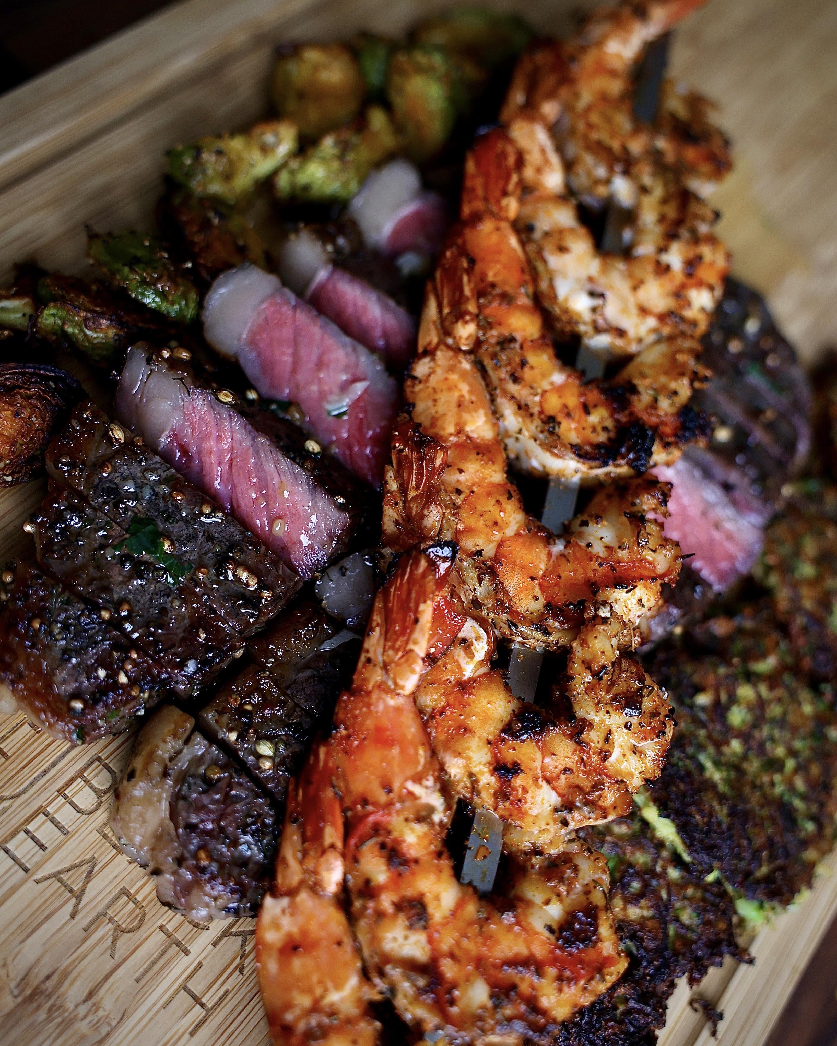 Wagyu striploin, Creole prawns, tallow cakes & cheesy sprouts… The ...